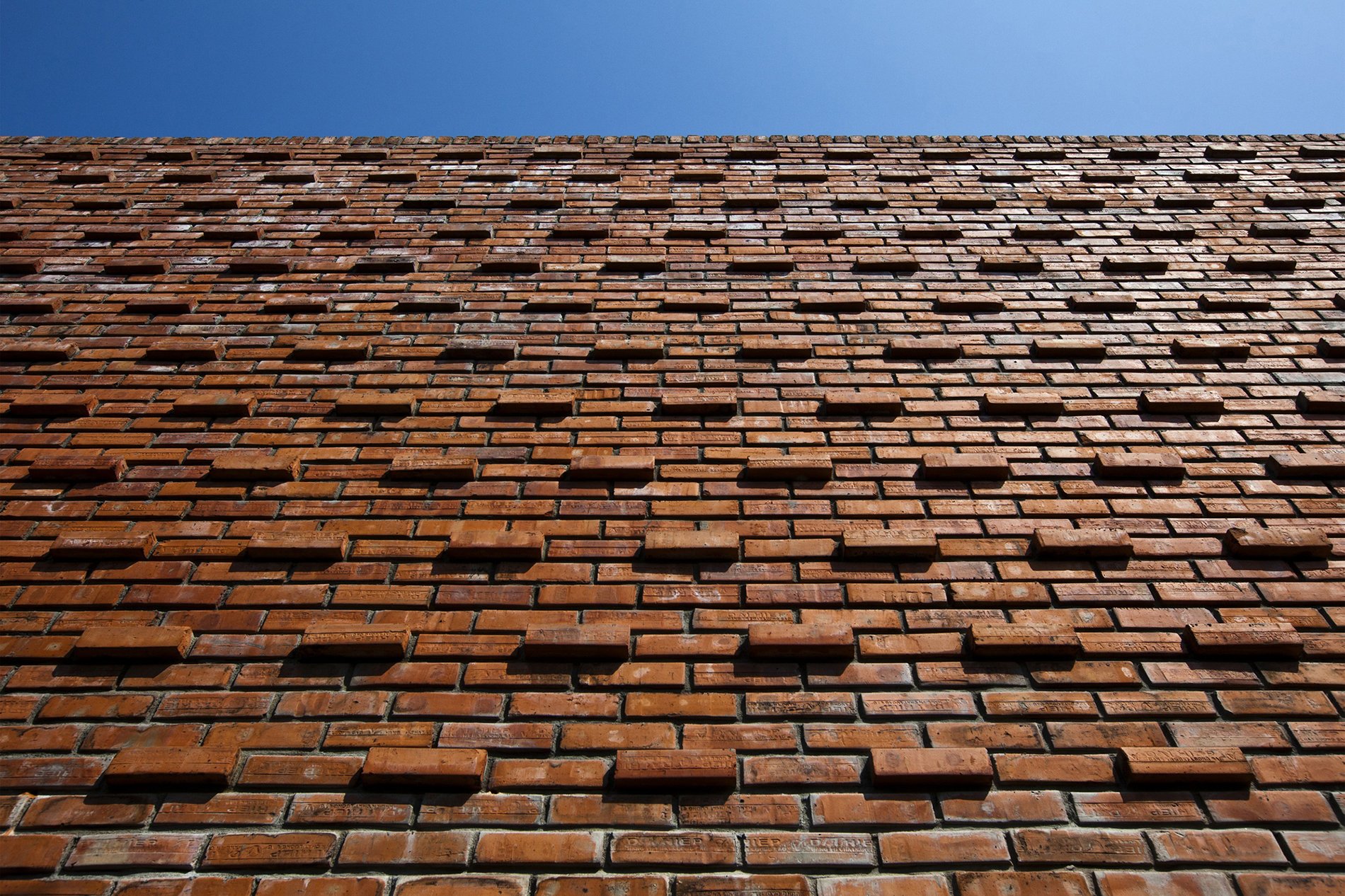 Vietnamese Home with Termite-Inspired Brickwork - Gessato