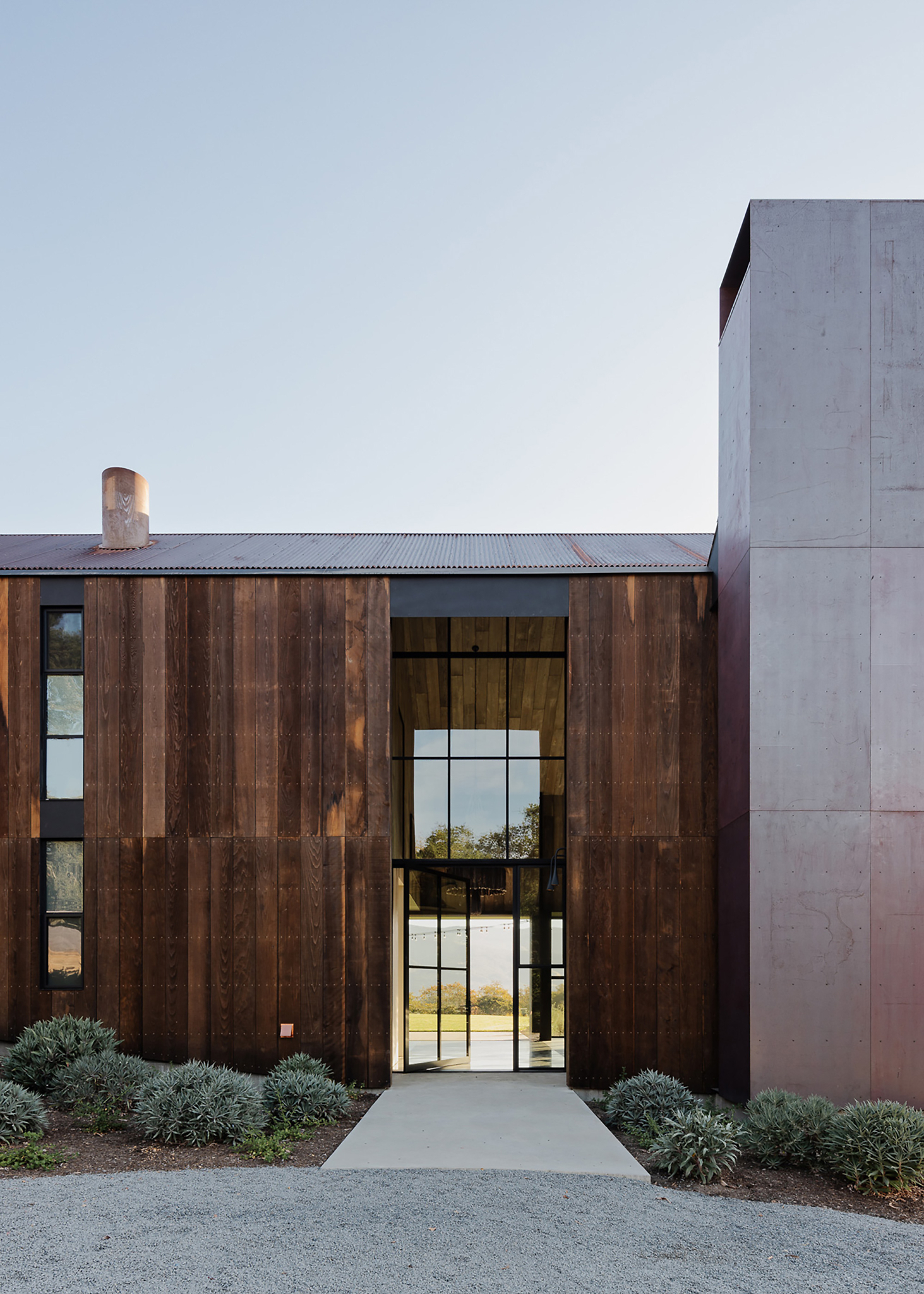 A Reclaimed Wood and Corten Steel Barn House - Gessato